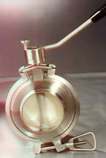 Silicone Coated Disc Valve For Tablets And Capsules