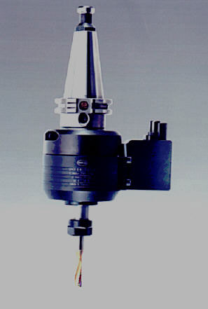 Self-Reversing Tapping Attachment